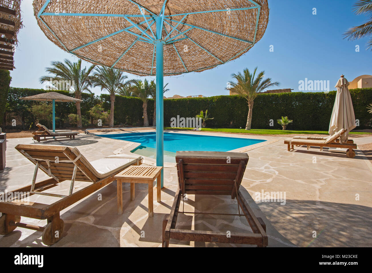 Luxury villa show home at tropical summer holiday resort with swimming ...