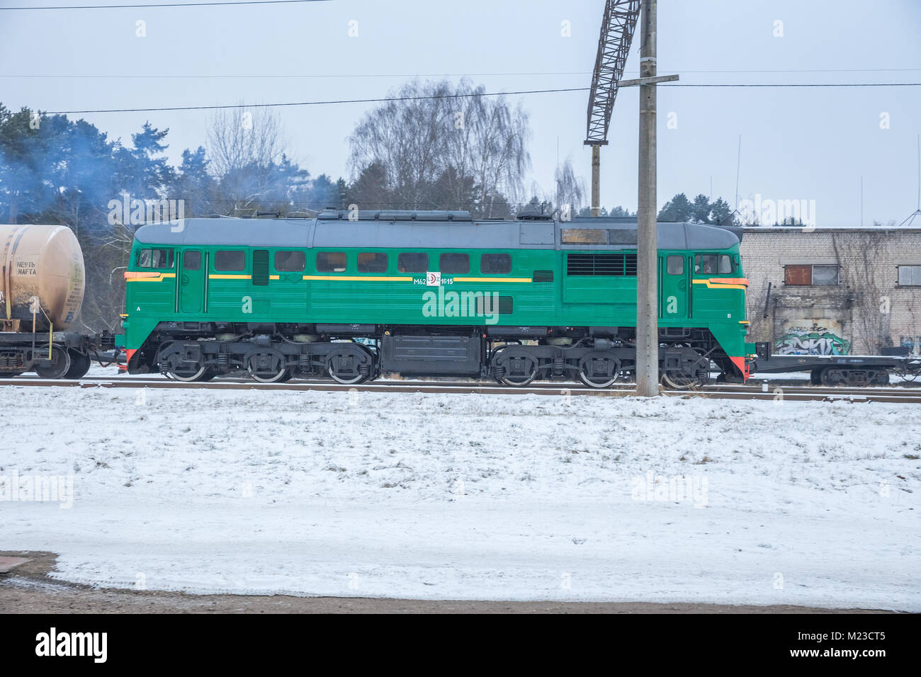 Railway with train in Riga, Latvia. Freight train. Winter, snow and ...