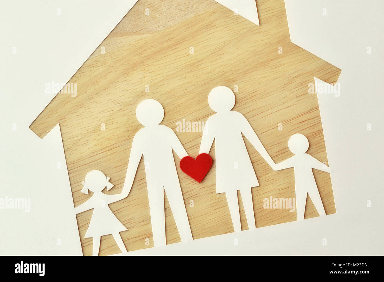 Paper family cut-out and house - Love and family union concept Stock ...