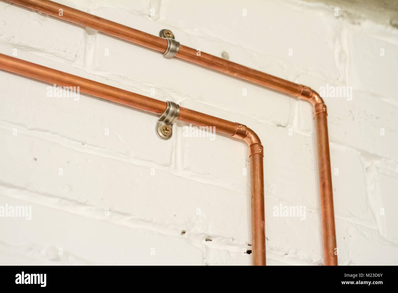 Retro socket made of white ceramic with open electrical wiring. Against ...