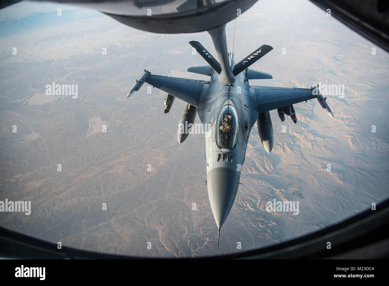 An F-16 Fighting Falcon is refueled by a 340th Expeditionary Air ...