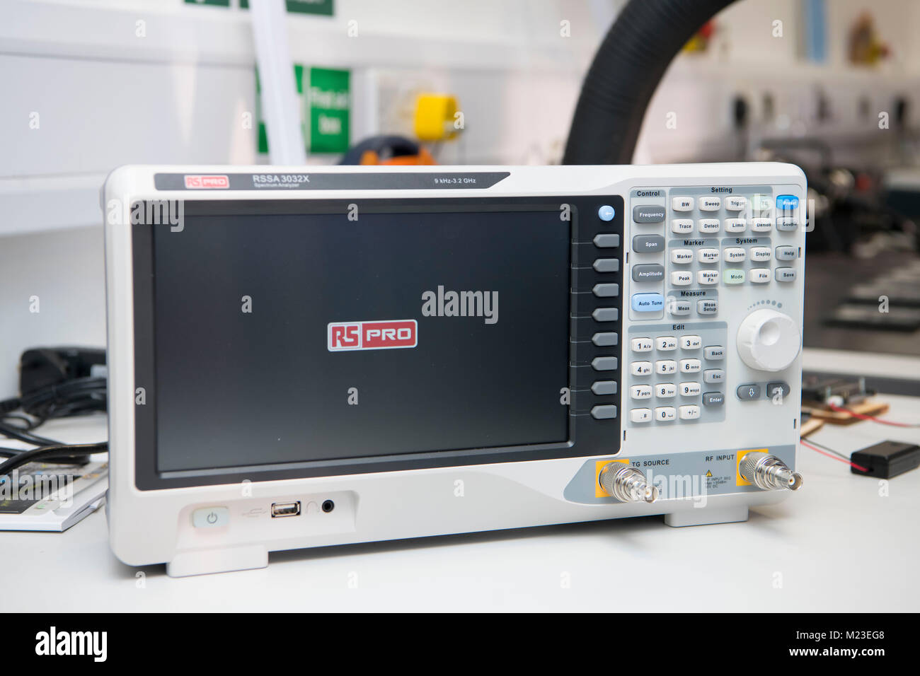 A spectrum analyser / oscilloscope in use in a laboratory workshop ...