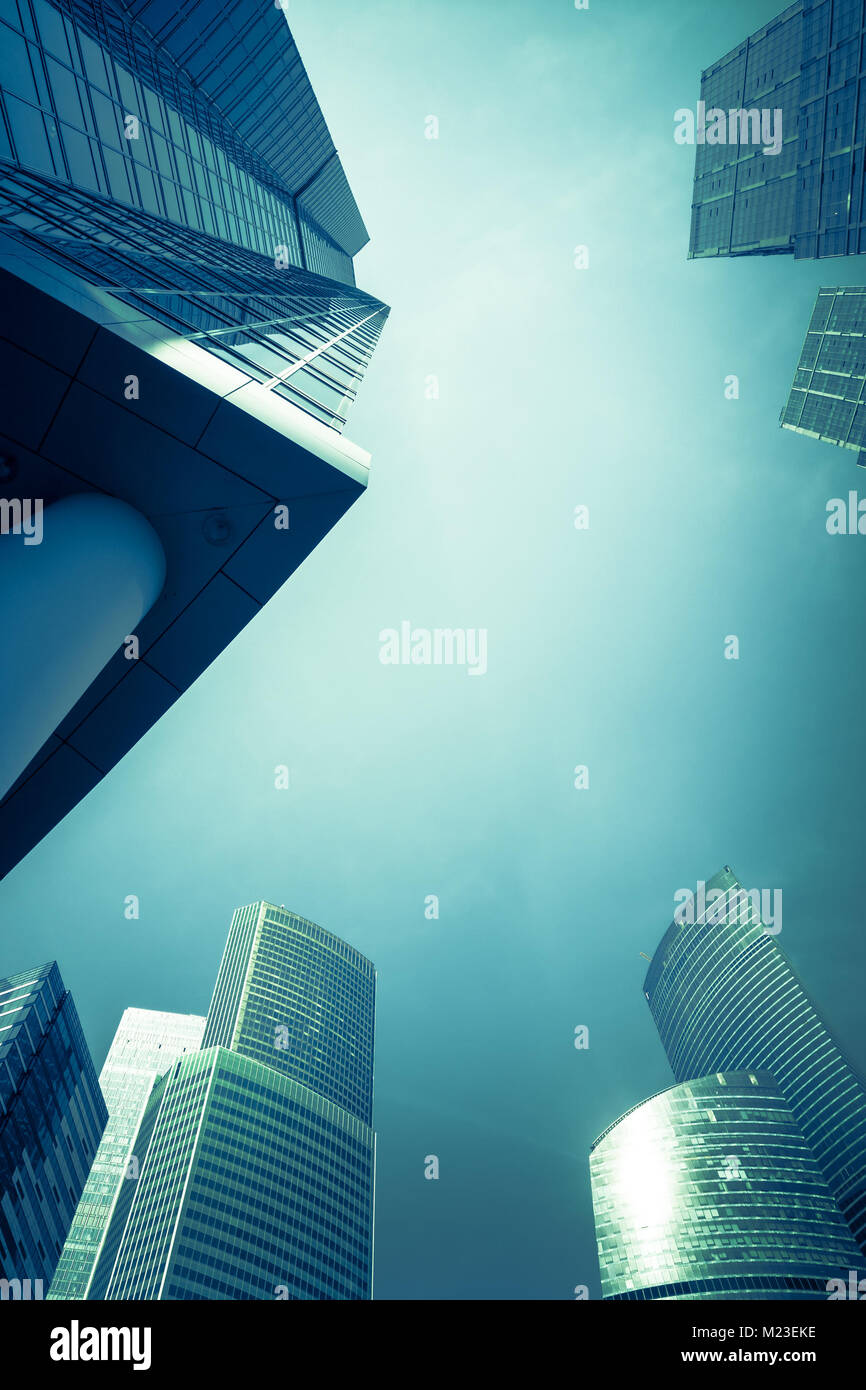 Futuristic bottom view of skyscrapers against misty sky Stock Photo - Alamy