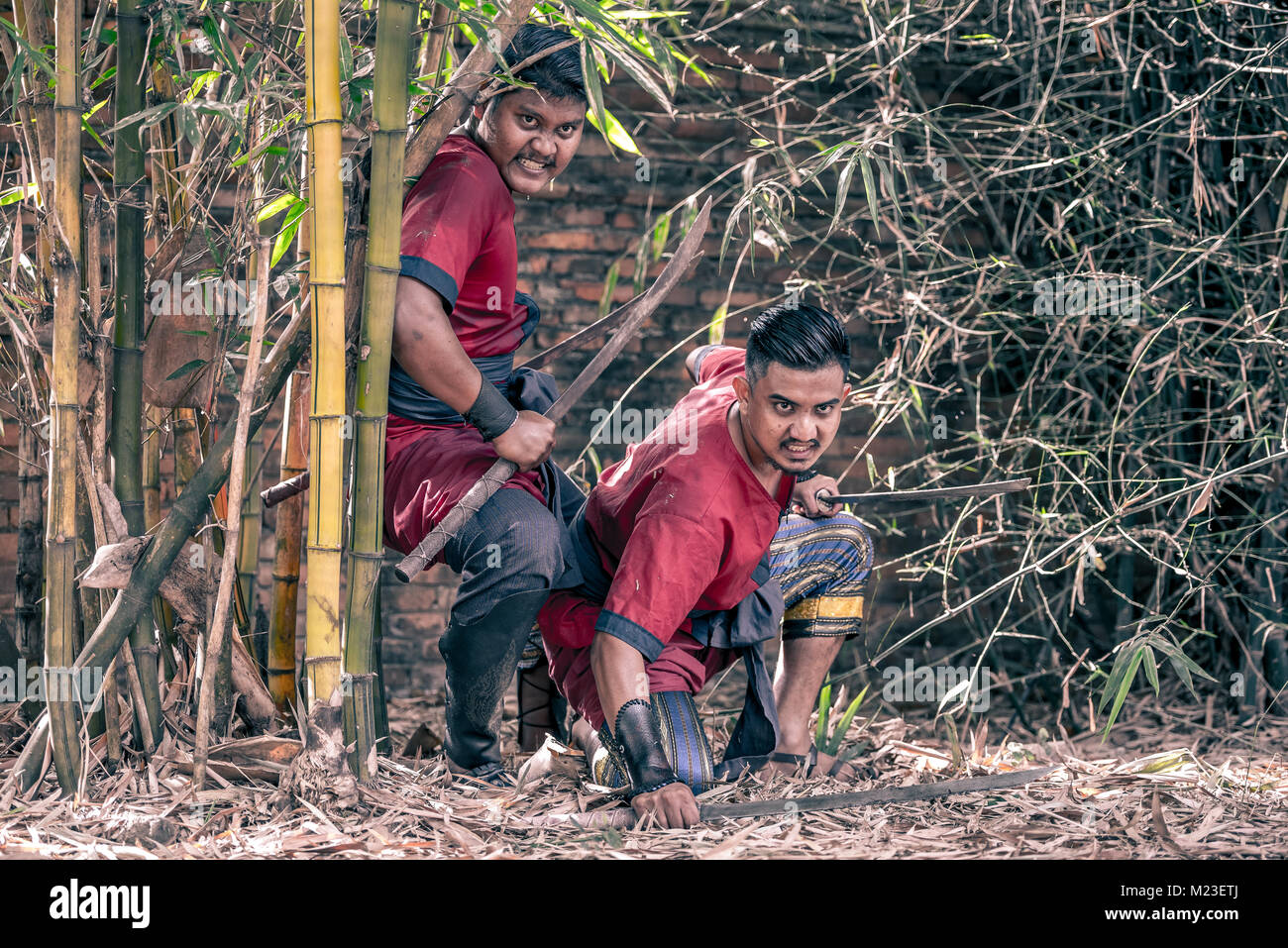 AYUTTHAYA, THAILAND - DECEMBER 17: Ancient swordman be ambush alert ...