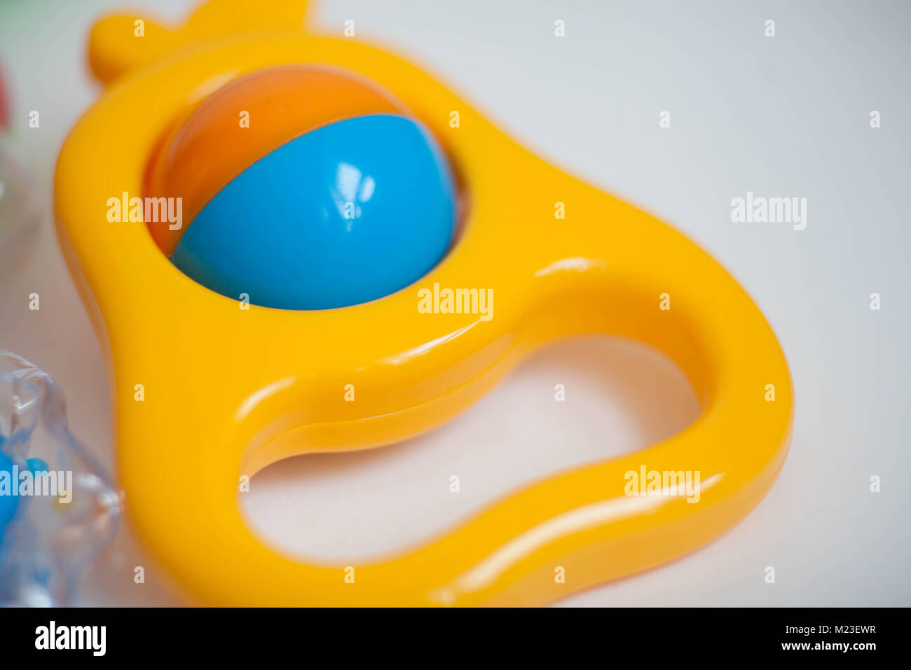 Baby toy for baby yellow color. Close up. Macro Stock Photo - Alamy