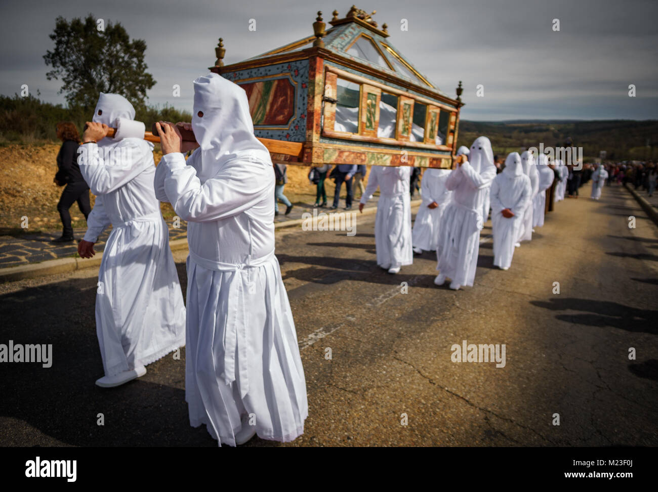 Easter traditional procession with coffin and tourists Stock Photo - Alamy