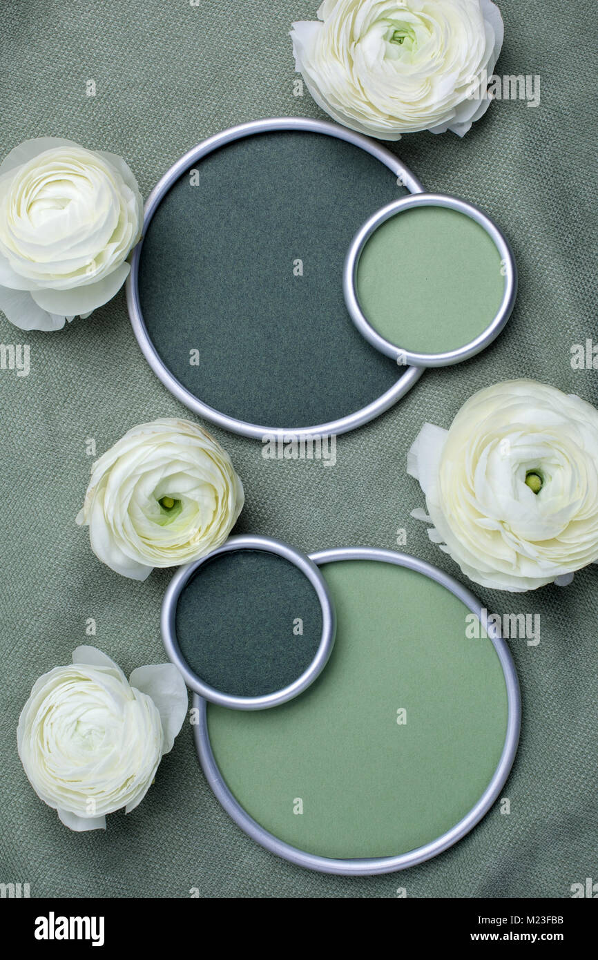 Ranunculus flowers with a round frame with a place for designer's text ...
