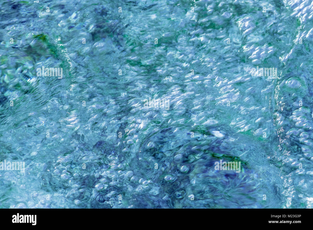 Abstract of blue bubbles in the water Stock Photo - Alamy