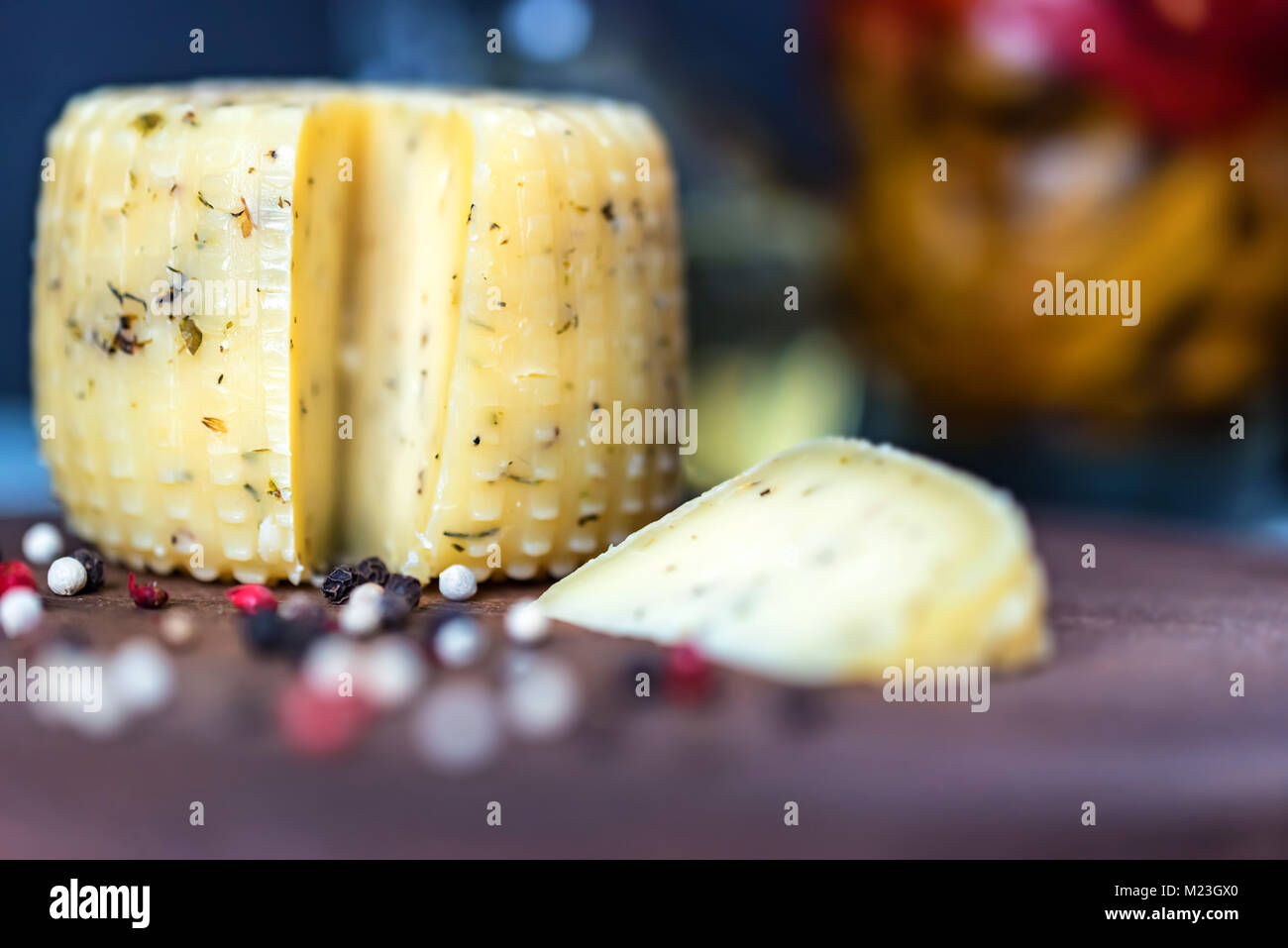 Rustic cheese with herbs and peppercorn Stock Photo - Alamy