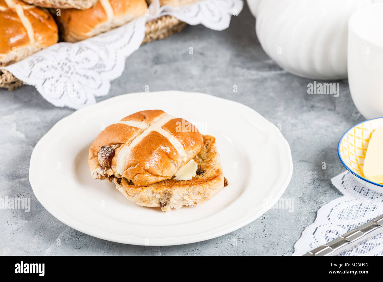 Easter Breakfast with Hot Cross Buns and Tea Stock Photo - Alamy