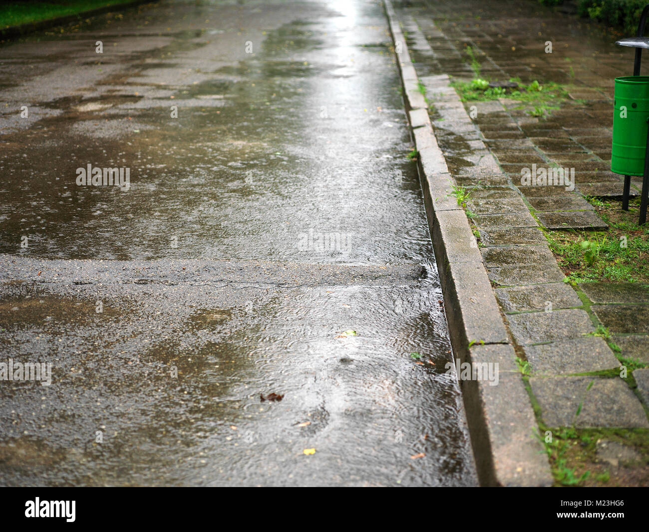Daytime shot of the rainy day and wet empty street Stock Photo - Alamy