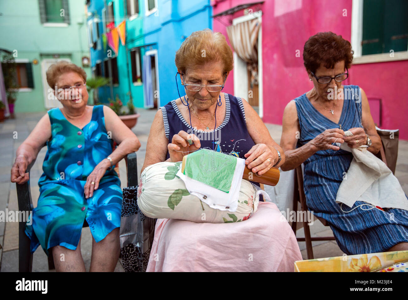 Lacemaking in picturesque Burano island, Italy Stock Photo - Alamy