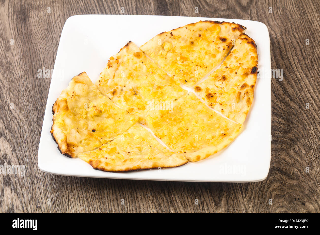 Indian bread - Naan with cheese and garlic Stock Photo - Alamy
