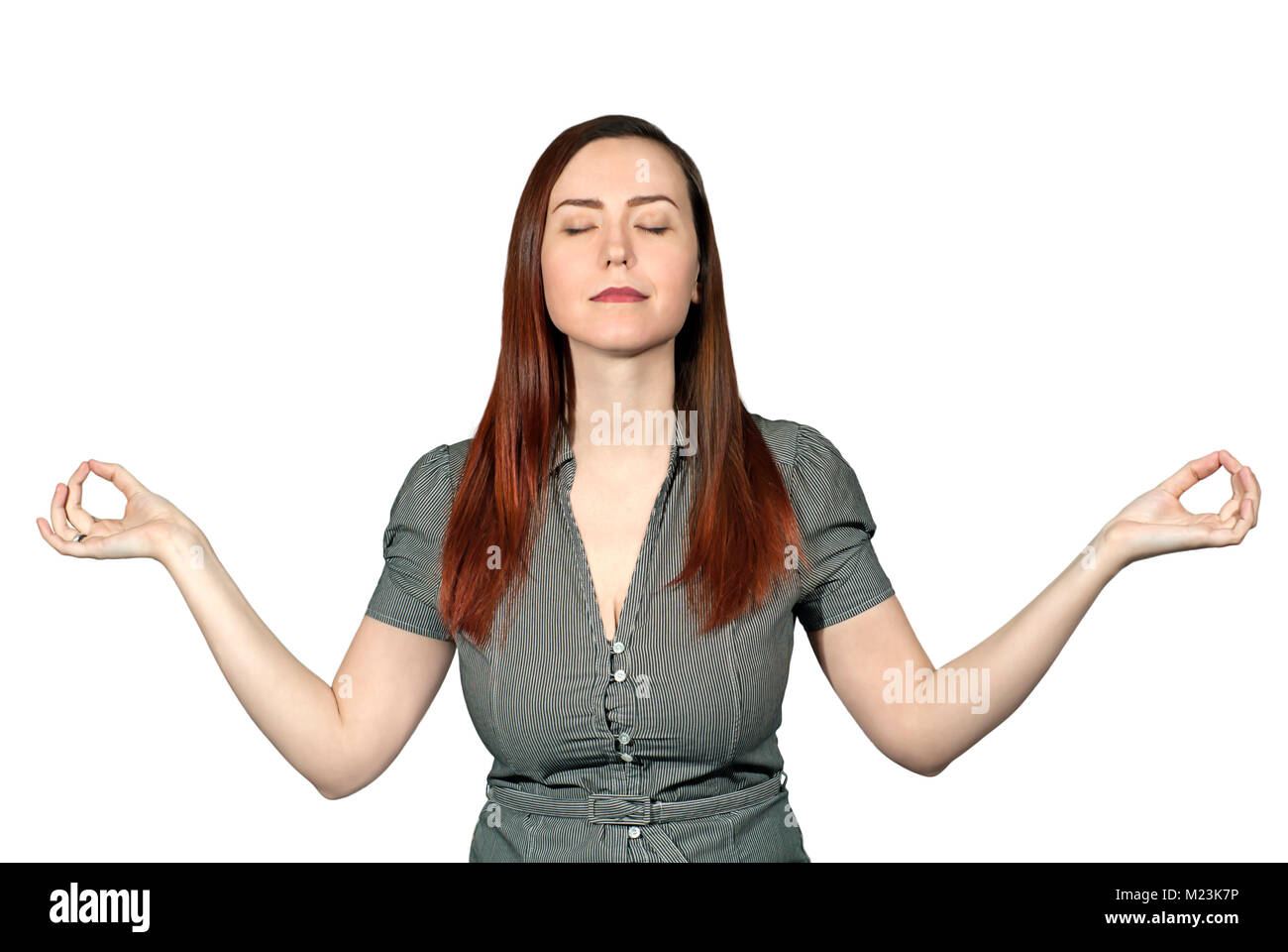 woman on a white background with closed eyes and a calm expression of ...