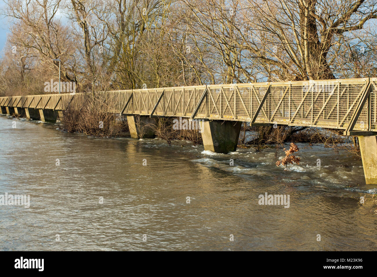 Footpath over the flooded Ouse Washes at Sutton Gault, Cambs Stock ...