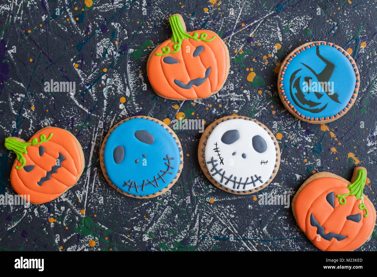Homemade gingerbread cookies in the form as Halloween jack-o-lantern ...