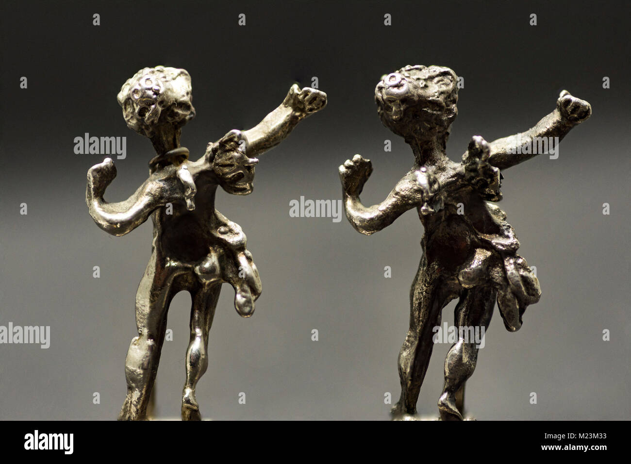 two metallic figurine angels are dancing Stock Photo - Alamy