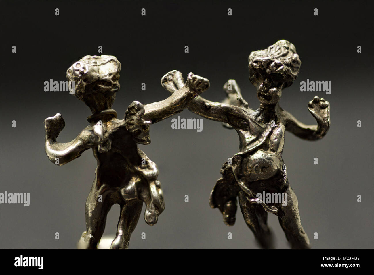 two metallic figurine angels are dancing Stock Photo - Alamy