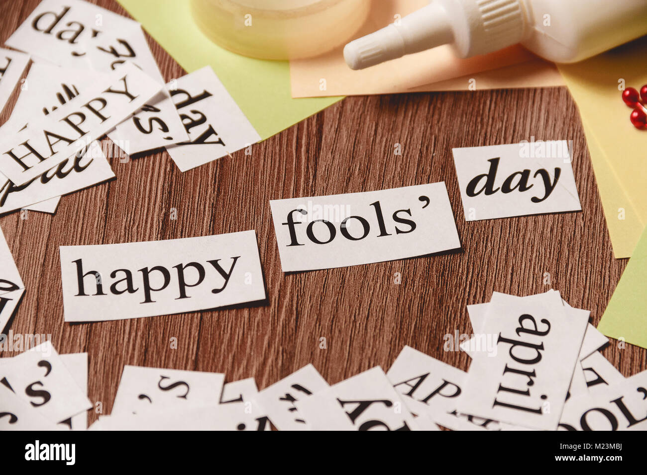 Happy Fools Day phrase on wooden background Stock Photo - Alamy