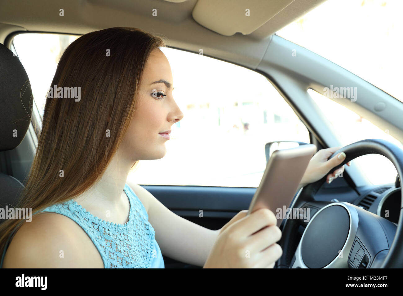 Distracted driver hi-res stock photography and images - Alamy