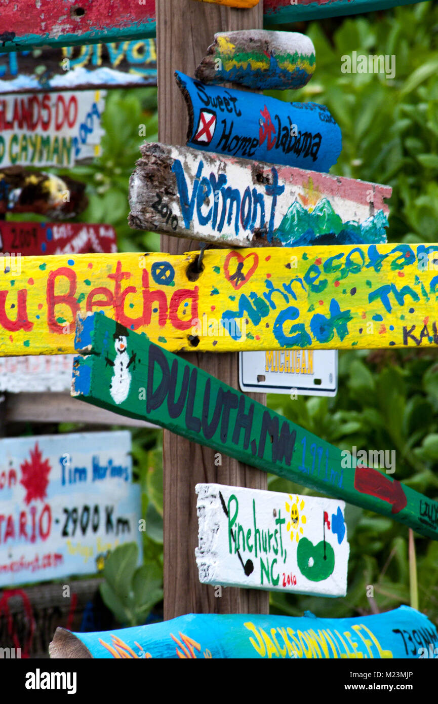 Brightly coloured signpost at East End, Grand Cayman, Caribbean Stock ...