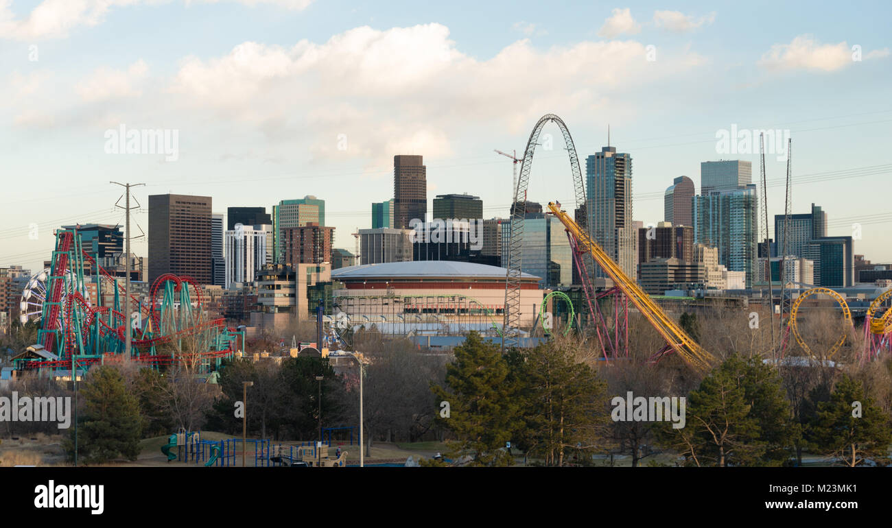 The Mile High City behind the amusement park rides of a local park ...