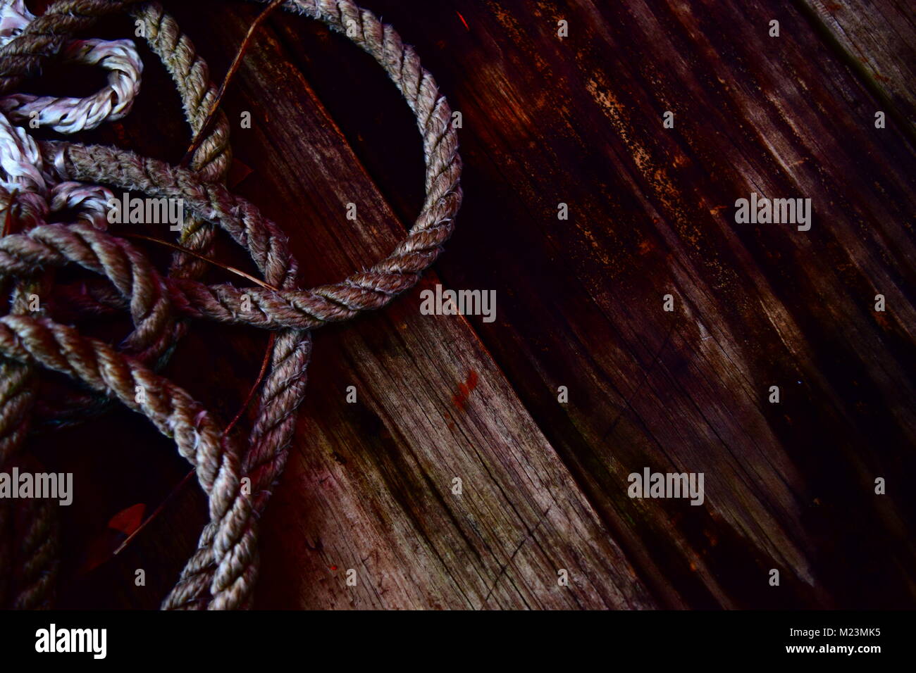 Rope on Wood Stock Photo - Alamy