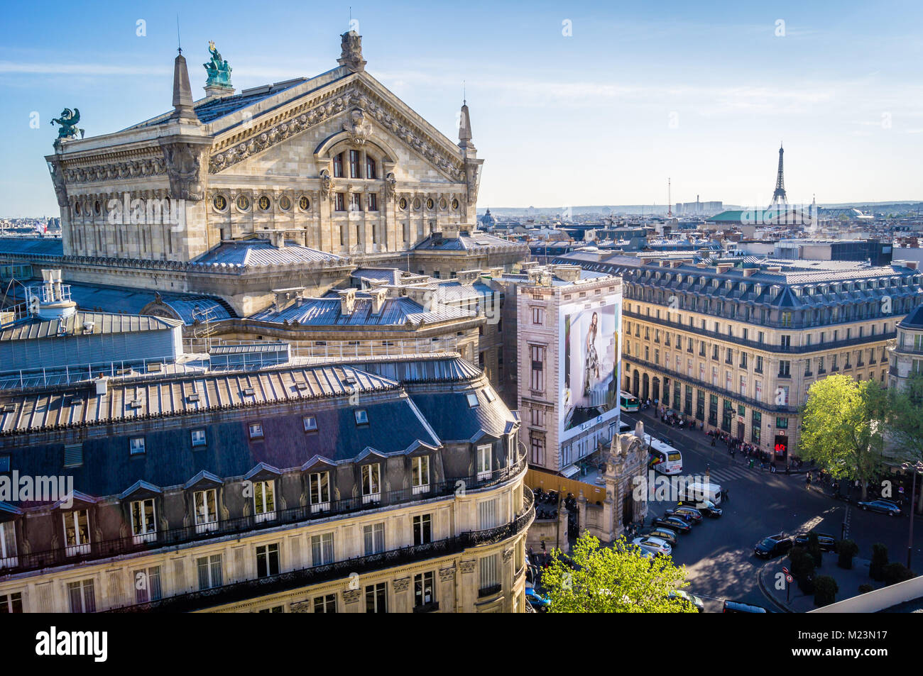 Paris roofs and eiffel tower on a sunny day Stock Photo - Alamy