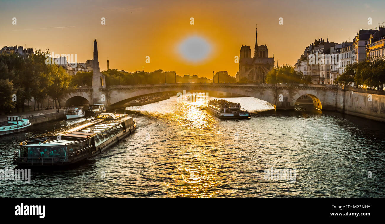 Sunset over Paris bridge and Notre-dame in the summer Stock Photo - Alamy