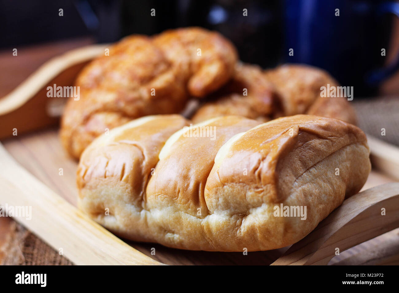 Bread on tray with coffee cup of background Stock Photo - Alamy