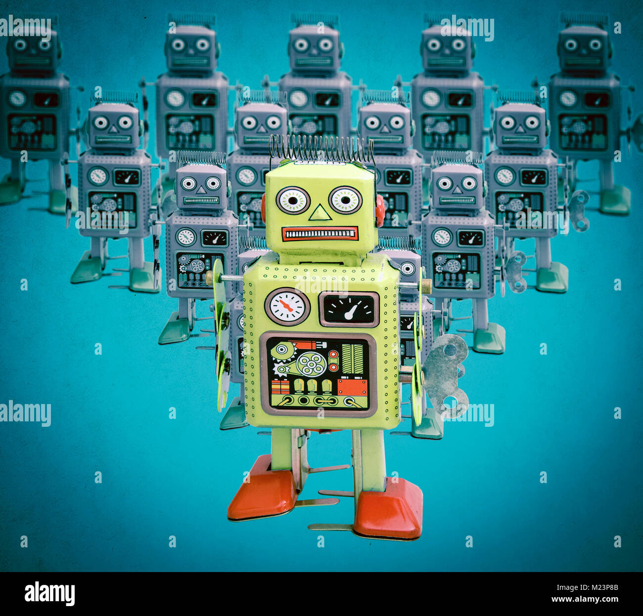 retro yellow robot leads the way Stock Photo - Alamy