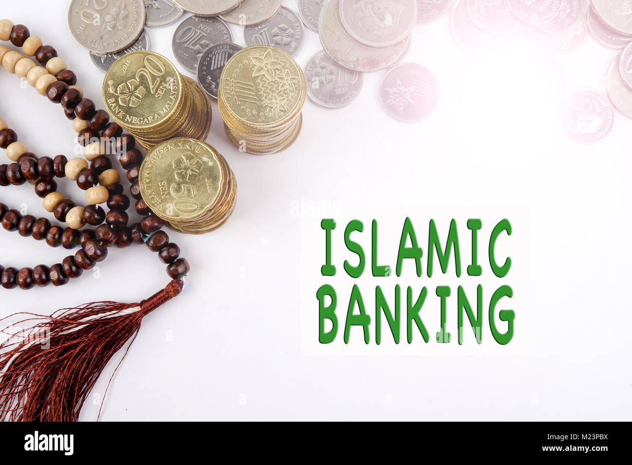 Rosary and coins. Islamic Banking/Finance concept Stock Photo - Alamy