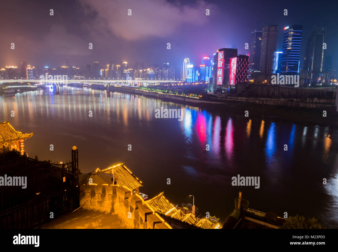 The skyline Qianximen Bridge over the Jialing river, Chongqing is ...