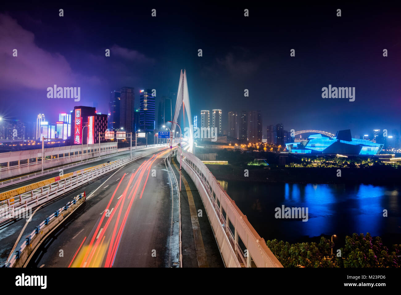The skyline Qianximen Bridge over the Jialing river, Chongqing is ...