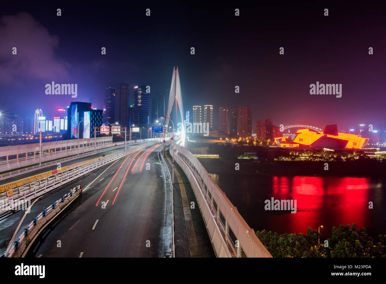 The skyline Qianximen Bridge over the Jialing river, Chongqing is ...