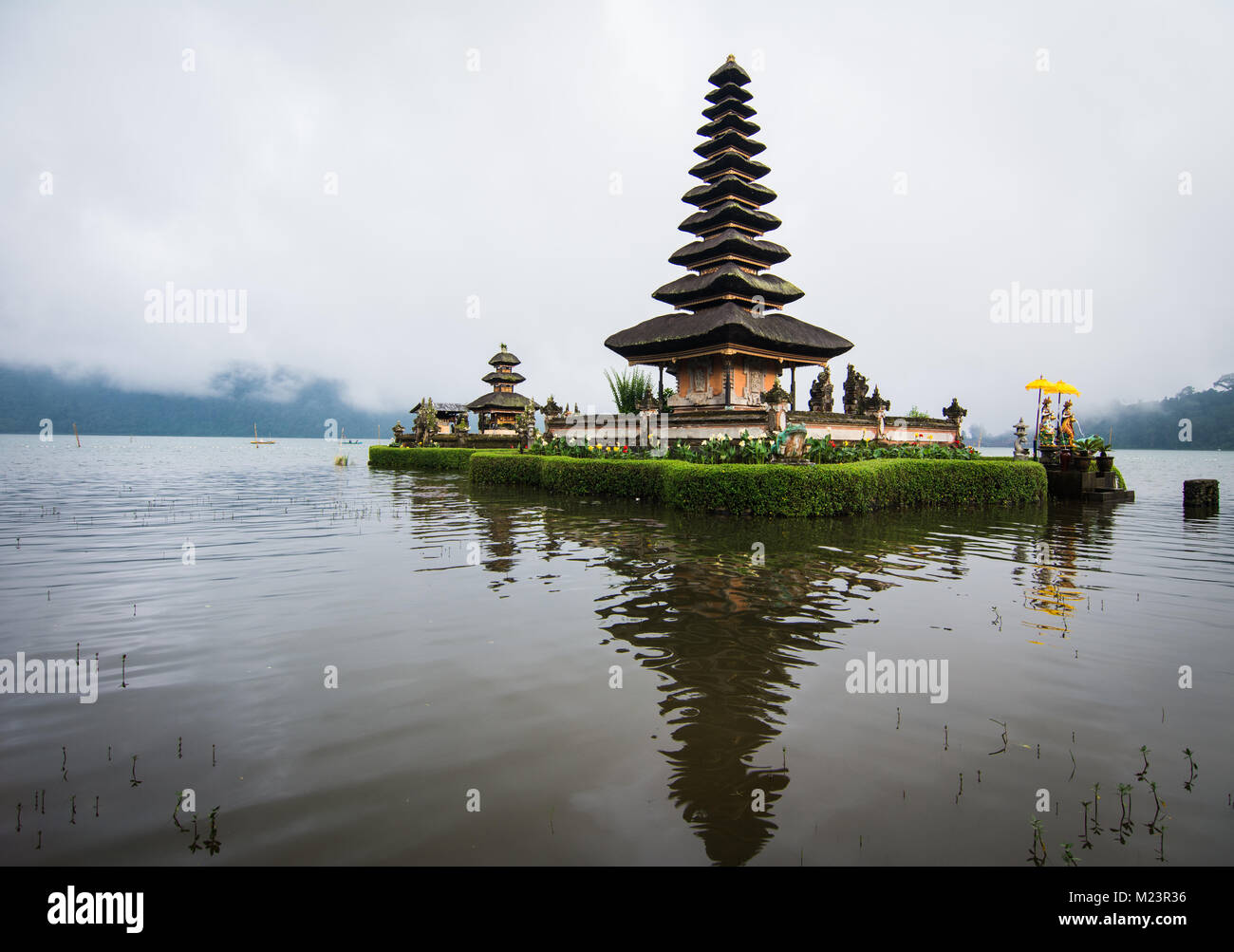 Pura Ulun Danu Beratan (Temple of Water) on Lake Bratan at rainy day in ...