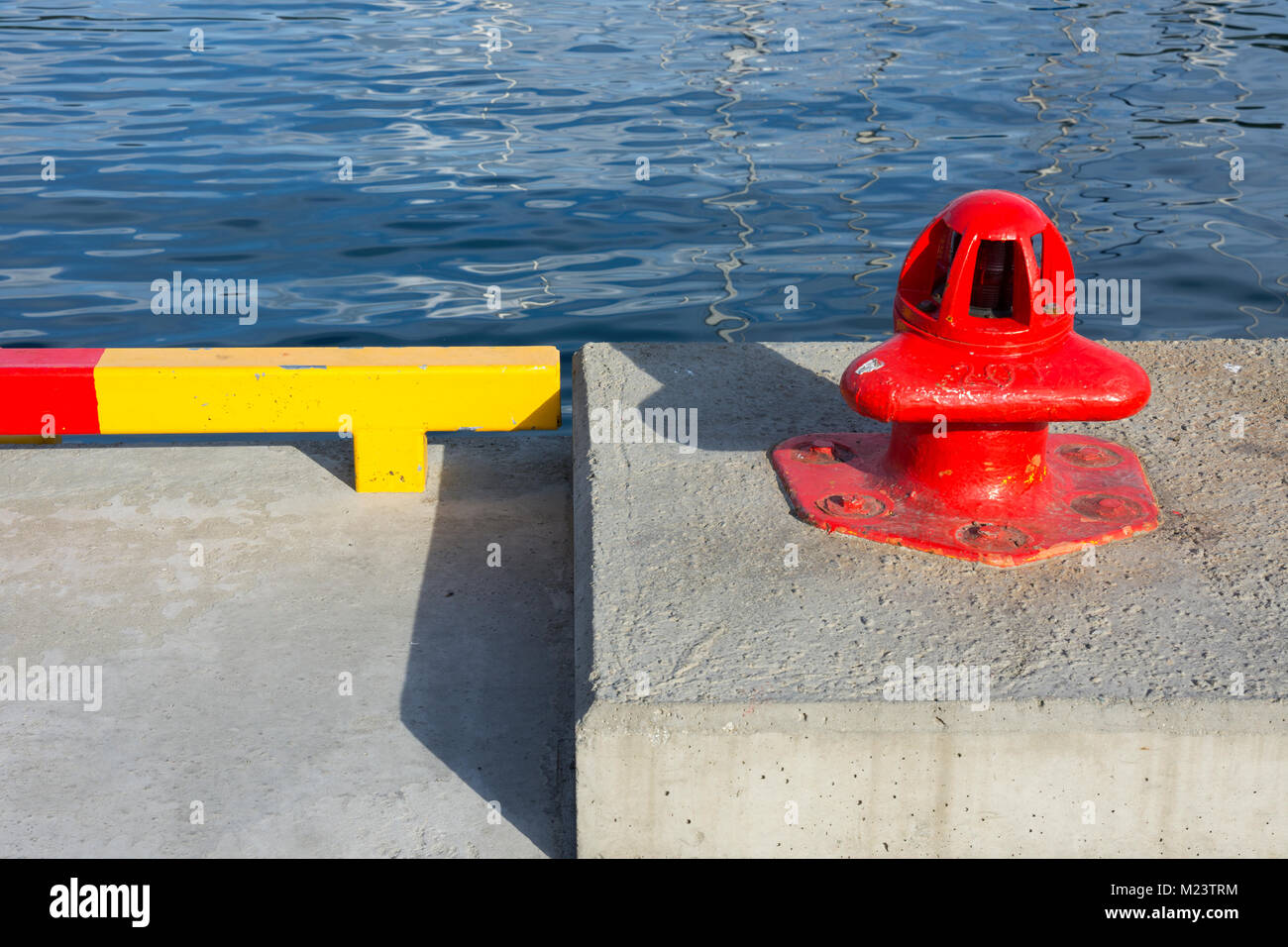 red bollard in the port of Tromso at the Lofoten islands in Norway ...