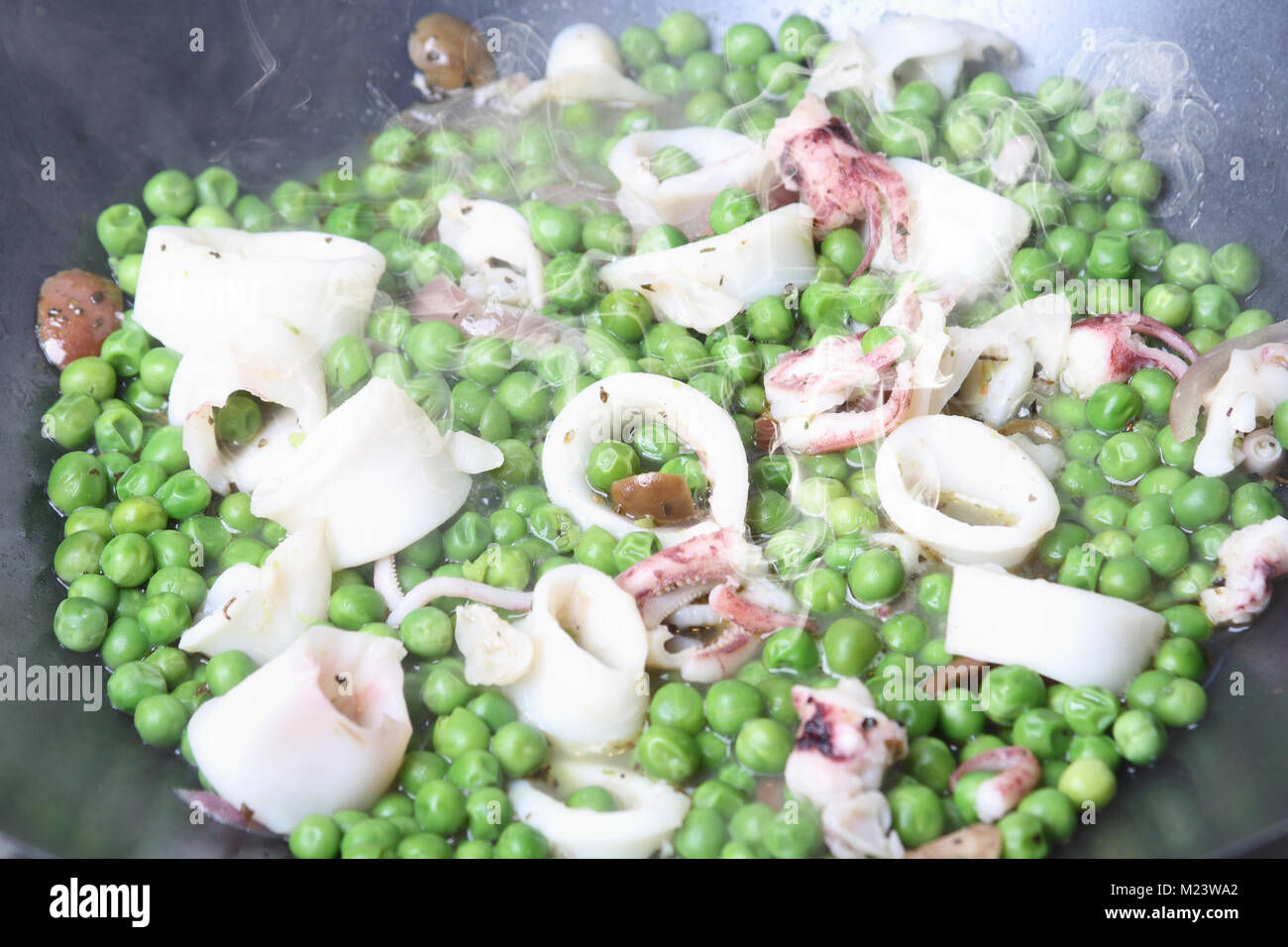 Cuttlefish with peas hi-res stock photography and images - Alamy