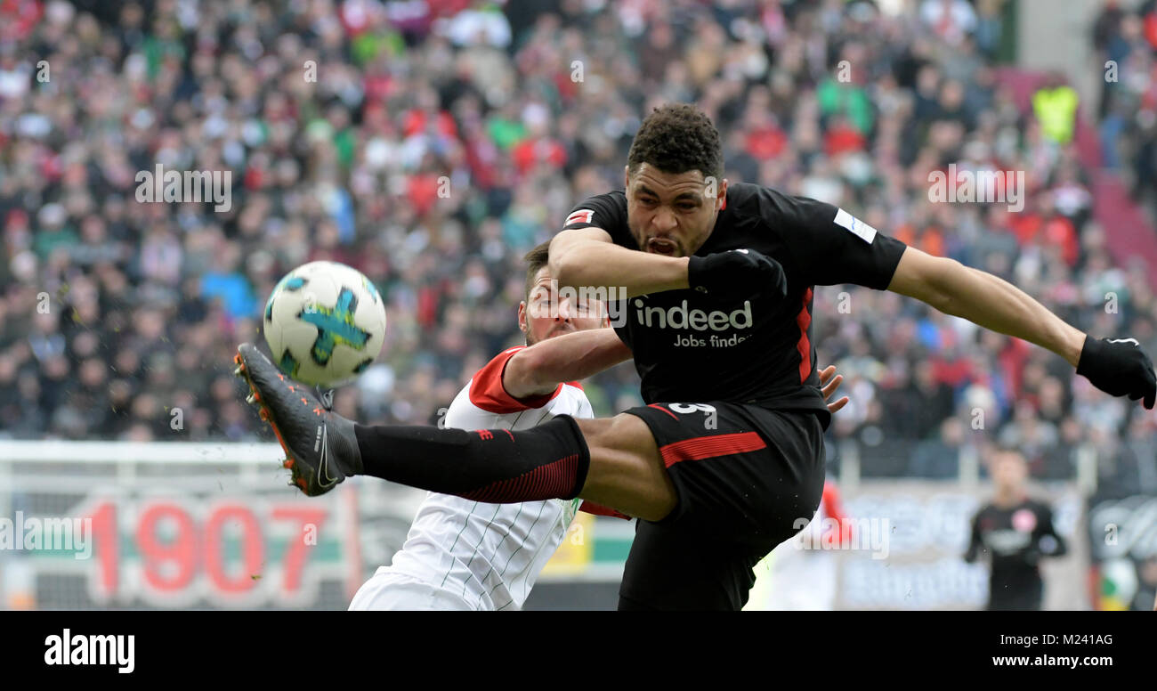 Augsburg, Germany. 4th Feb, 2018. Augsburg's Marcel Heller (l) and ...