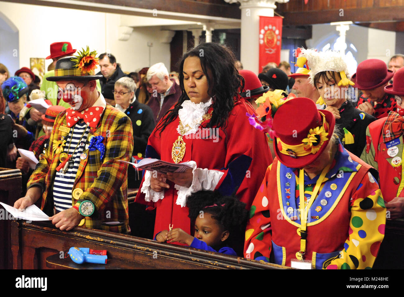 Soraya Adejare (Speaker of Hackney Council) and Pip the Clown listening ...