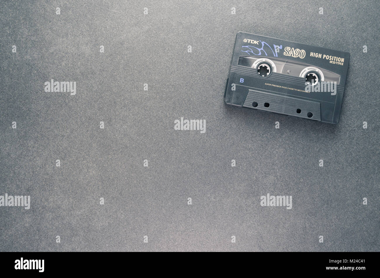 compact magnetic tape analog audio recording cassette - directly above ...