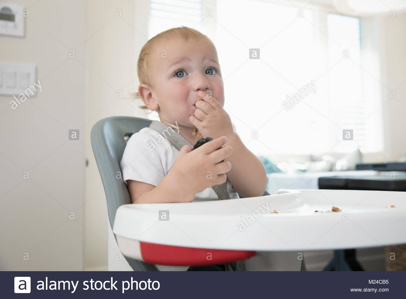 Boy chair eating hi-res stock photography and images - Alamy