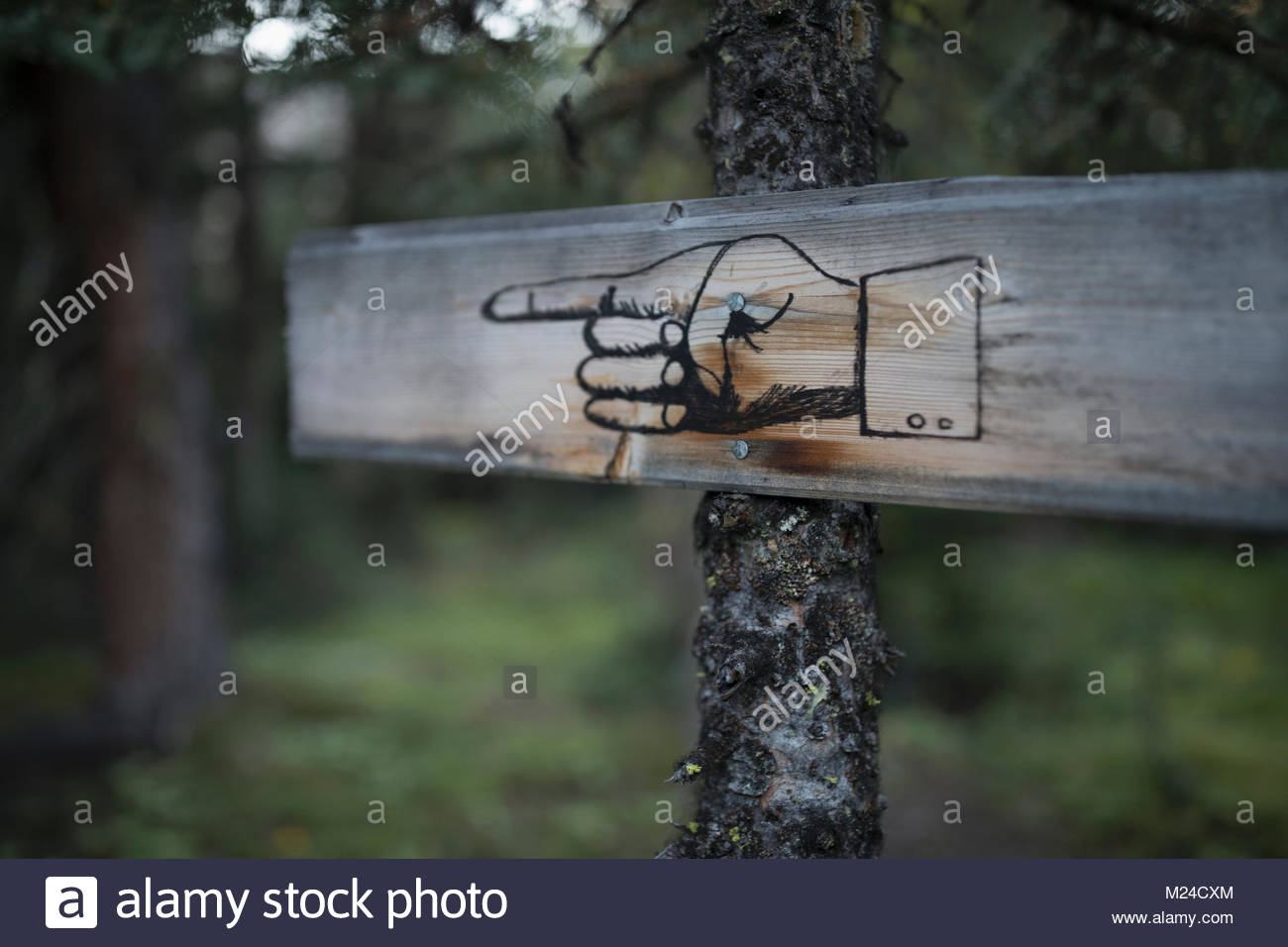 Wooden finger sign hi-res stock photography and images - Alamy