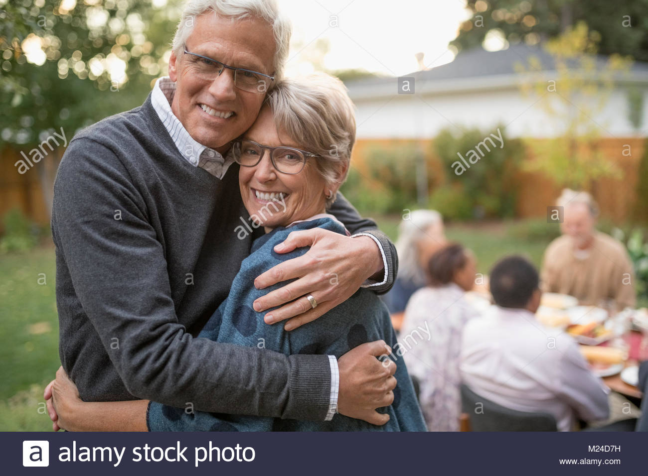 Couple hugging party hi-res stock photography and images - Alamy