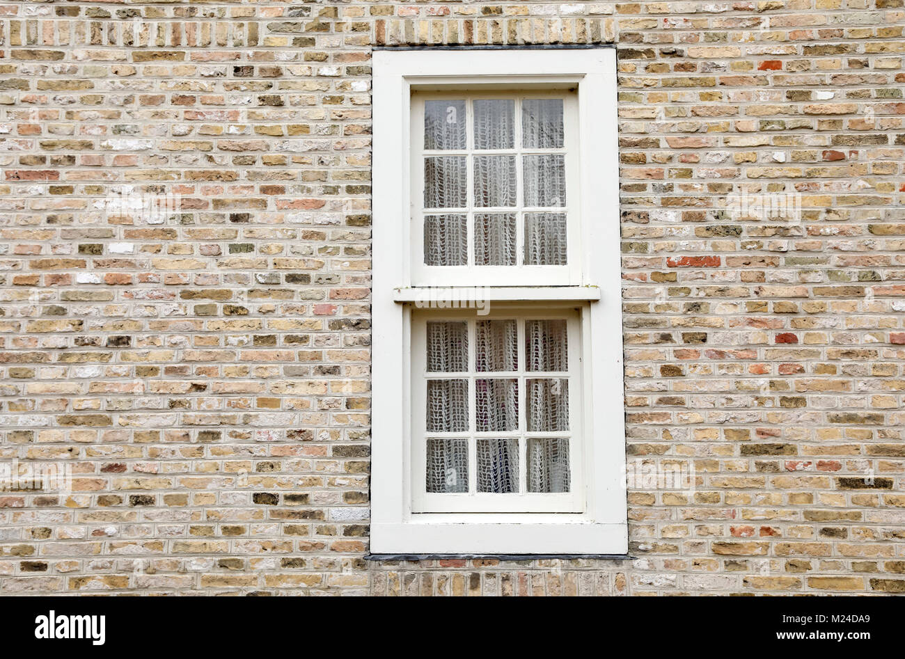 white wooden window on brick wall Stock Photo - Alamy