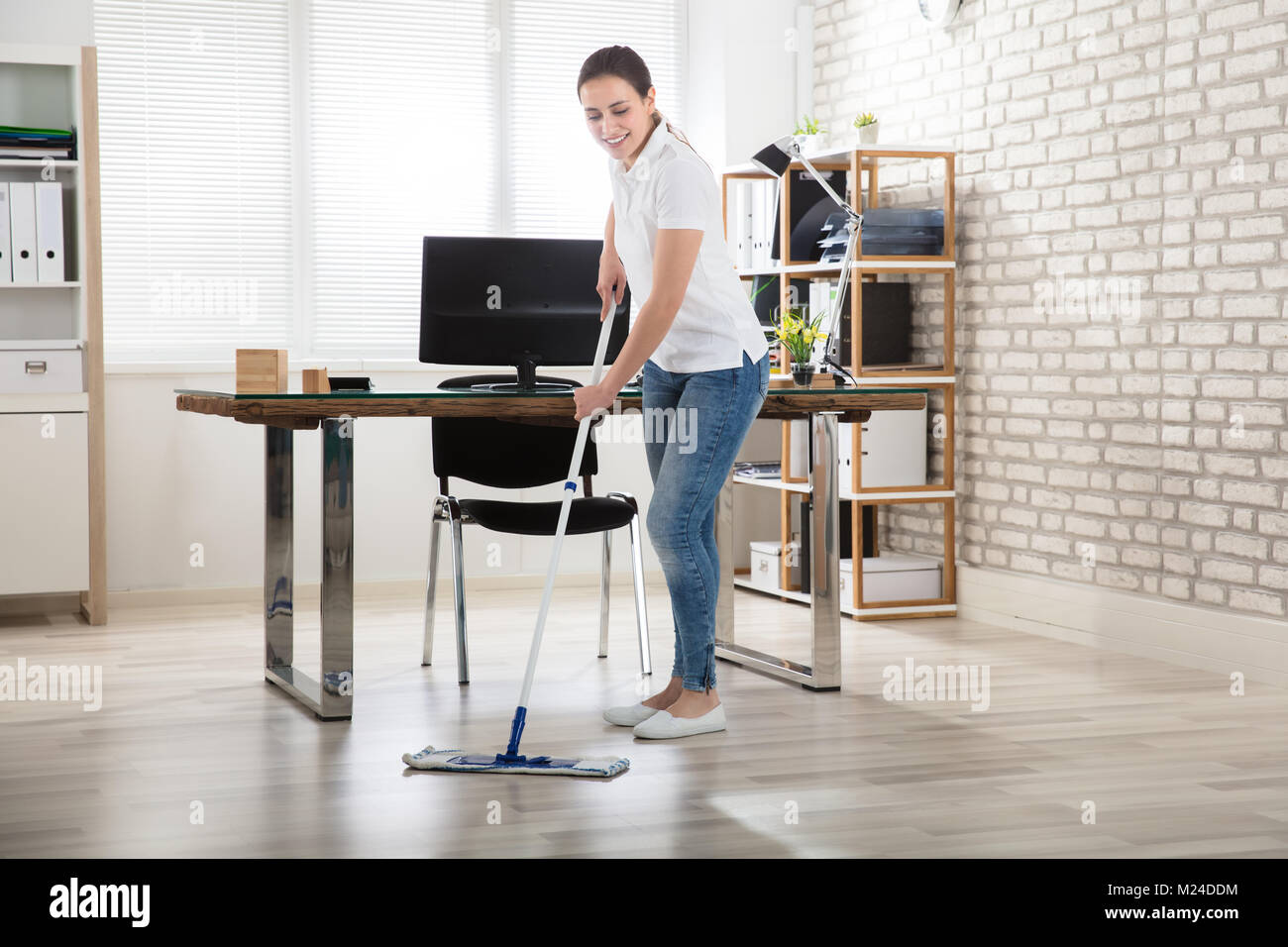 Woman floor office cleaning hi-res stock photography and images - Alamy