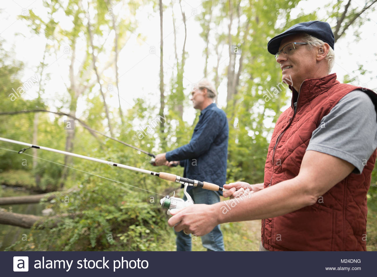 Man using fishing rod hi-res stock photography and images - Alamy