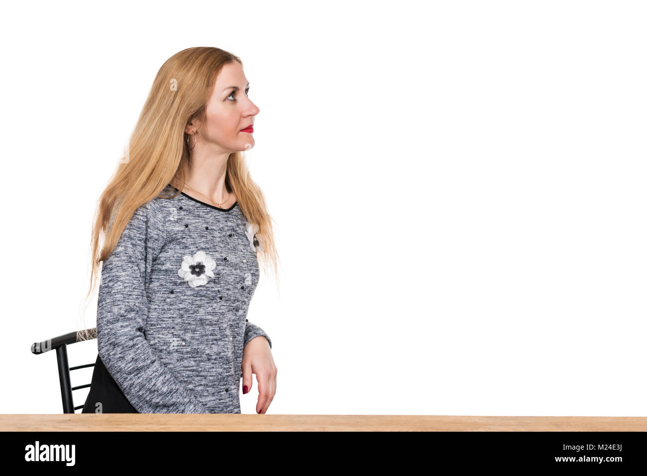 Young woman sitting side profile chair hi-res stock photography and ...