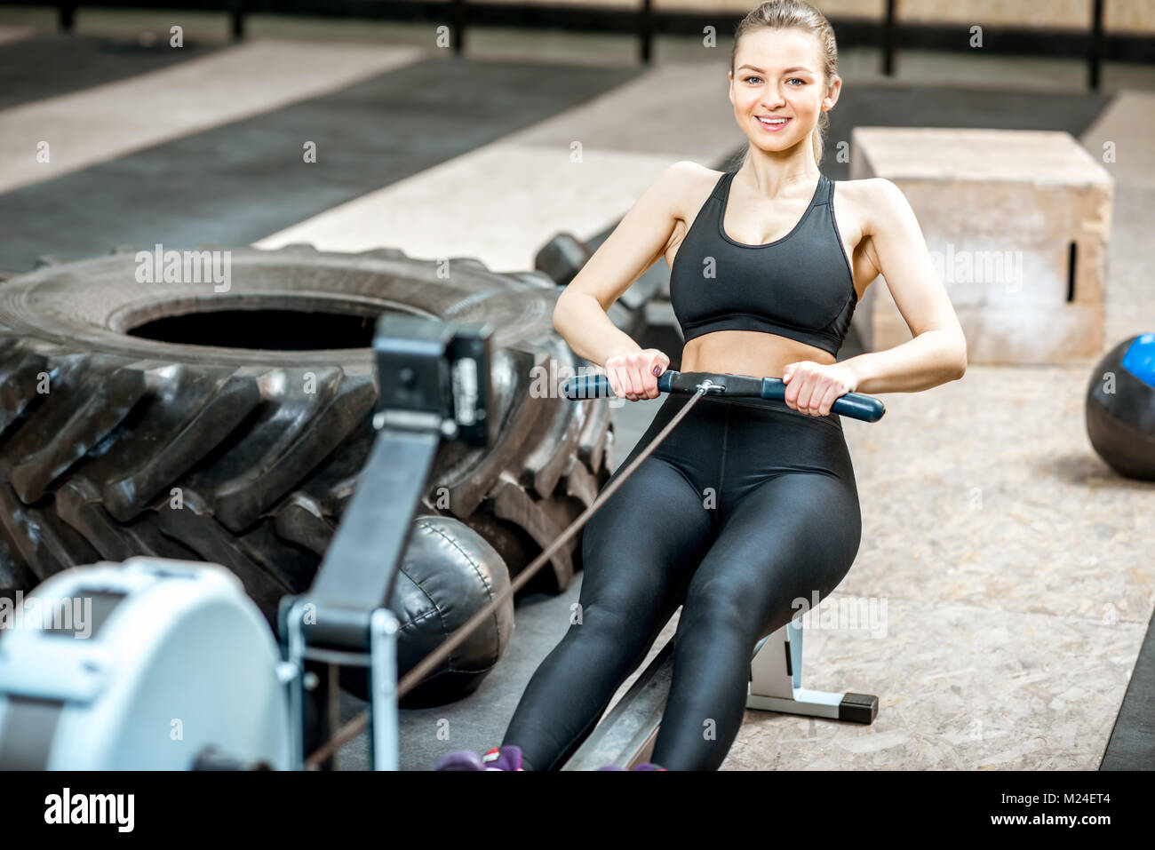 Exercise on rowing machine hi-res stock photography and images - Alamy