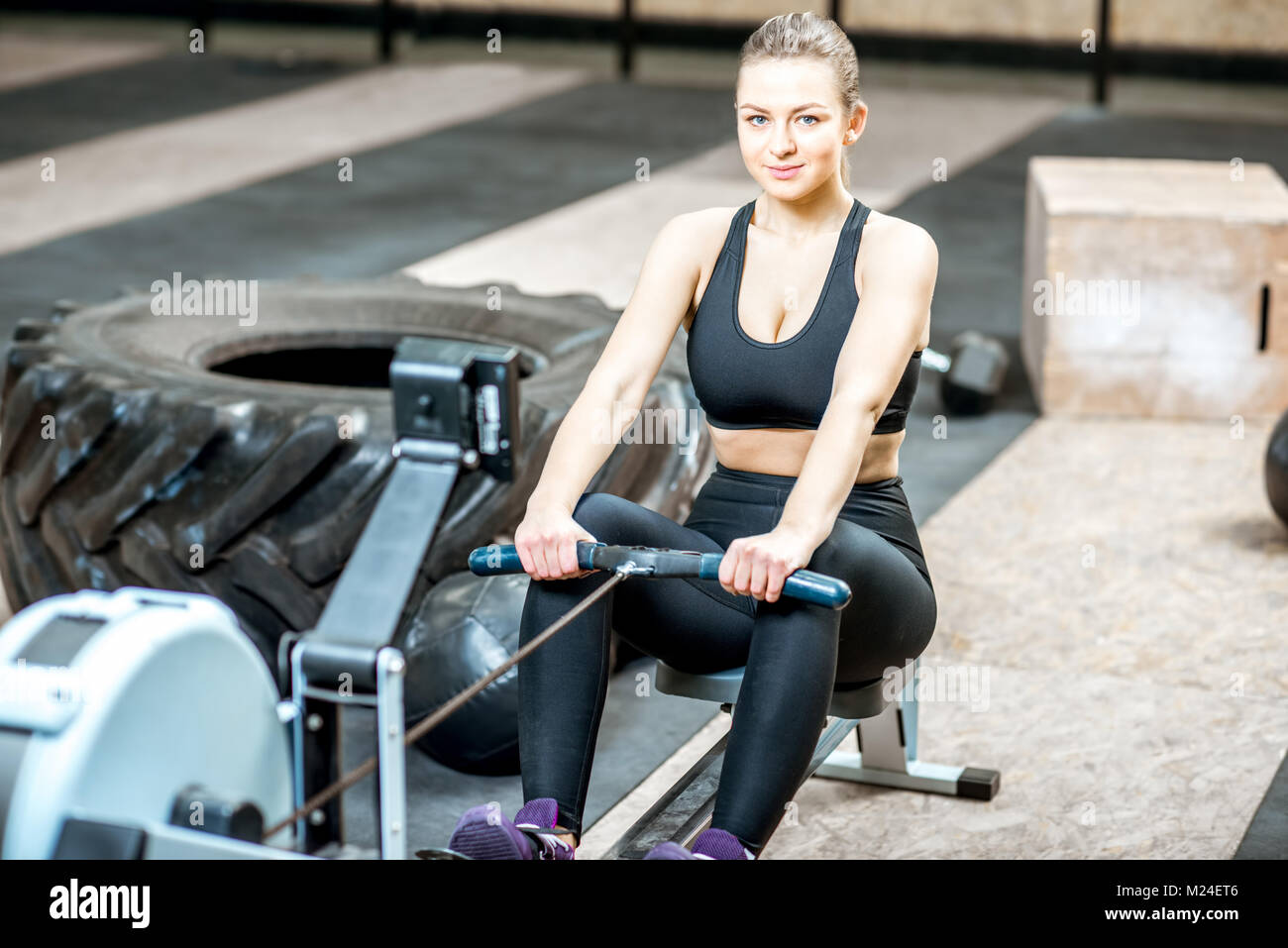 Woman, rowing, gym hi-res stock photography and images - Alamy